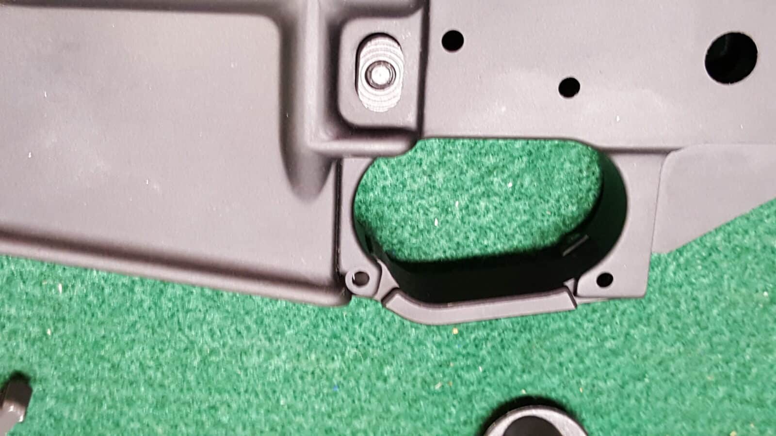 Assembling an AR Lower - Step 2 of 11: Installing the Trigger Guard ...