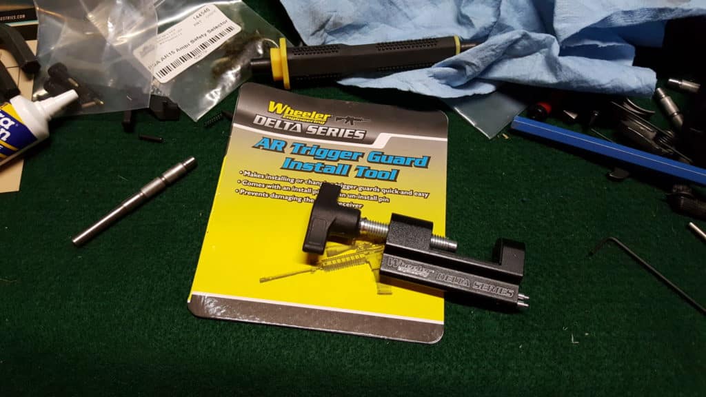 Assembling an AR Lower - Step 2 of 11: Installing the Trigger Guard ...